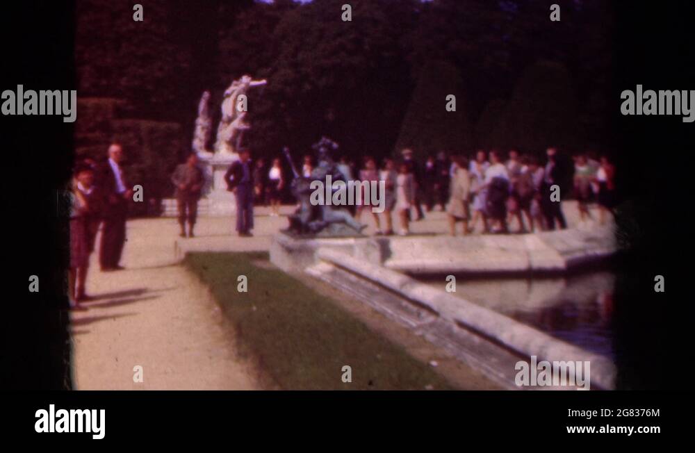 PARIS FRANCE-1939: A Group Of People Walking Together Around A Pond ...