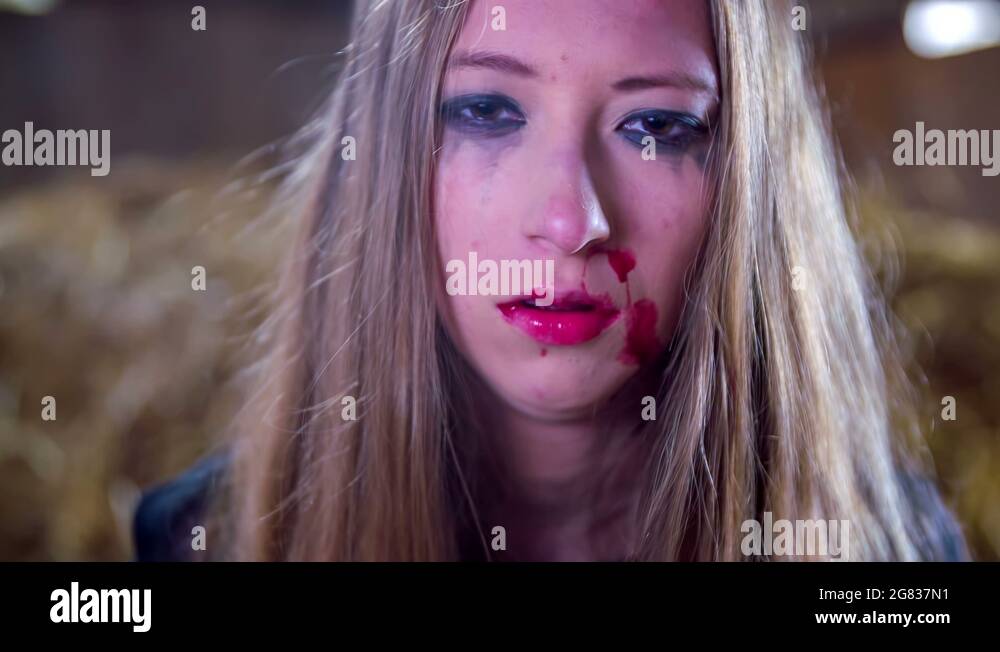 Scared girl tied up on a chair Stock Video Footage - Alamy