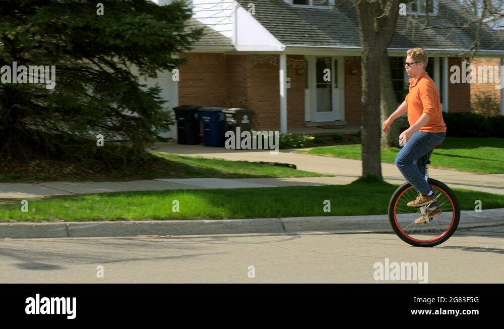 Man riding unicycle Stock Videos & Footage - HD and 4K Video Clips - Alamy