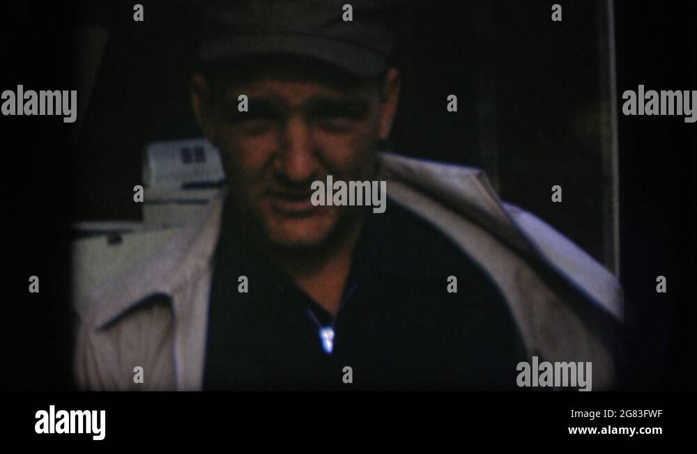 Two men wearing caps Stock Videos & Footage - HD and 4K Video Clips - Alamy