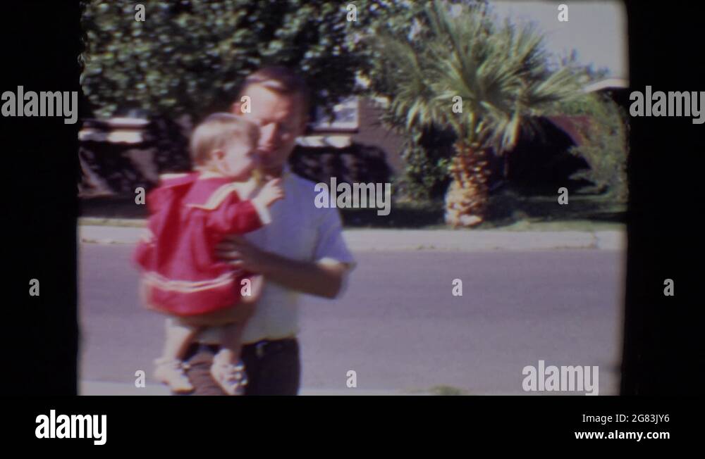 TUCSON ARIZONA USA-1967: A Man Holds His Baby Girl With His Wife And ...