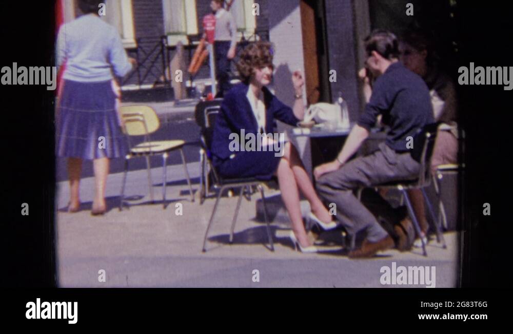 LONDON ENGLAND-1963: Couple Talking In Cafe In The City Center On Sunny ...