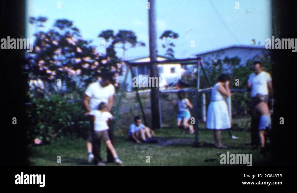 FLORIDA-1958: Kids Playing On Playground As Parents Watch And Talk With ...
