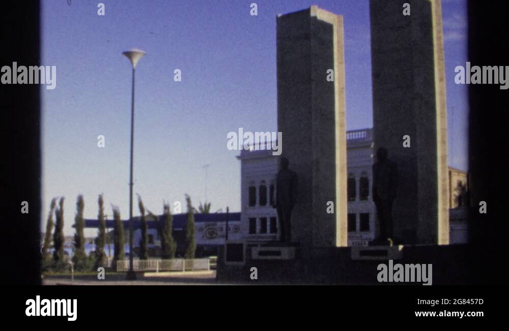 GUAYMAS MEXICO-1975: Tall Buildings Large Metal Statues Statues Lean ...