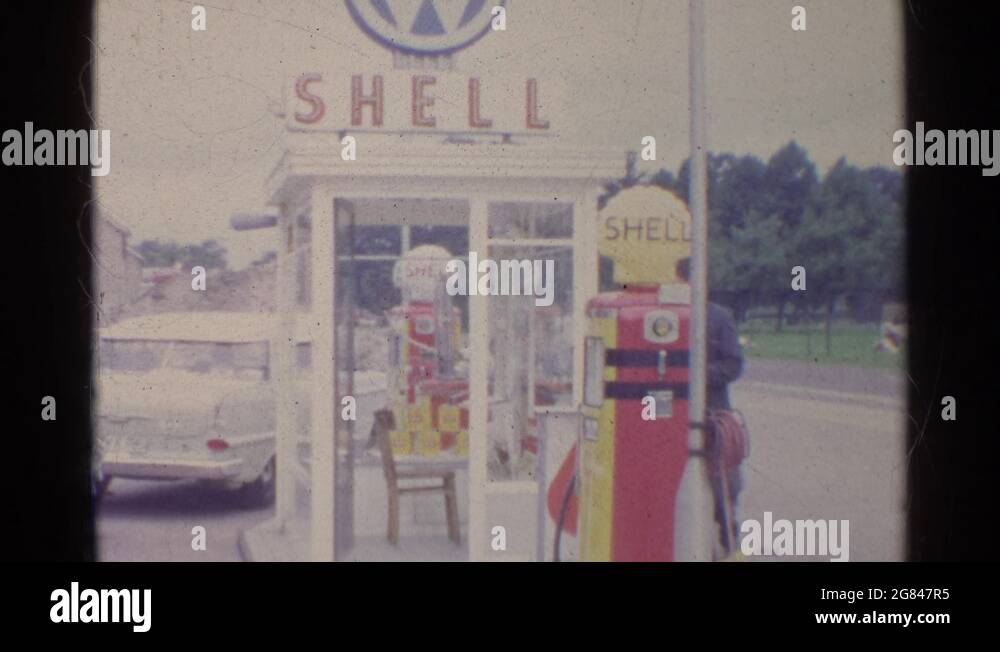 GERMANY-1961: A Man Walking Into A Phone Booth At A Shell Gas Station ...