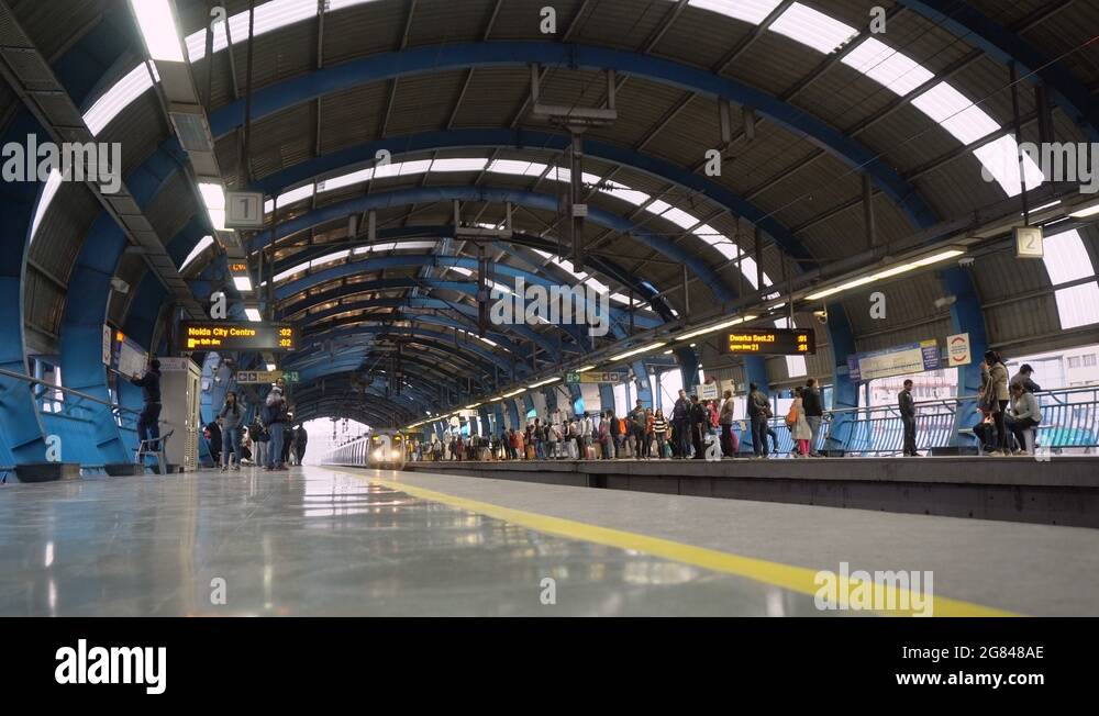 Modern India Metro Train Arriving at Station & Commuters Entering ...