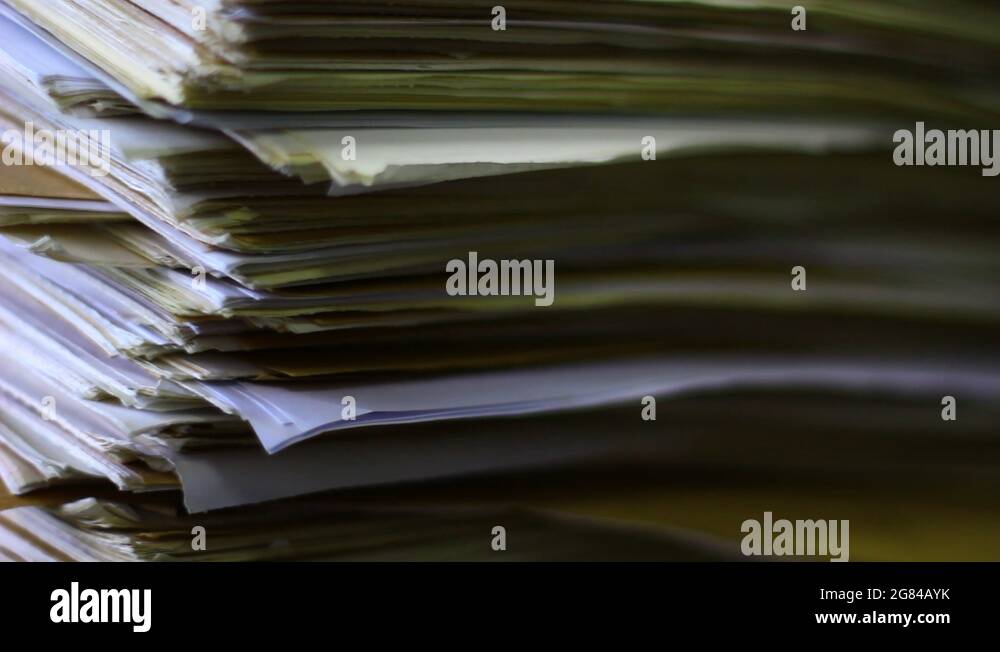 A stack of old documents Stock Video Footage - Alamy