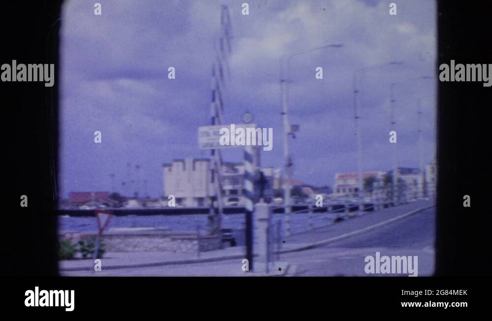 NASSAU BAHAMAS-1964: Driveway Entering Labour With Man Walking Stock ...