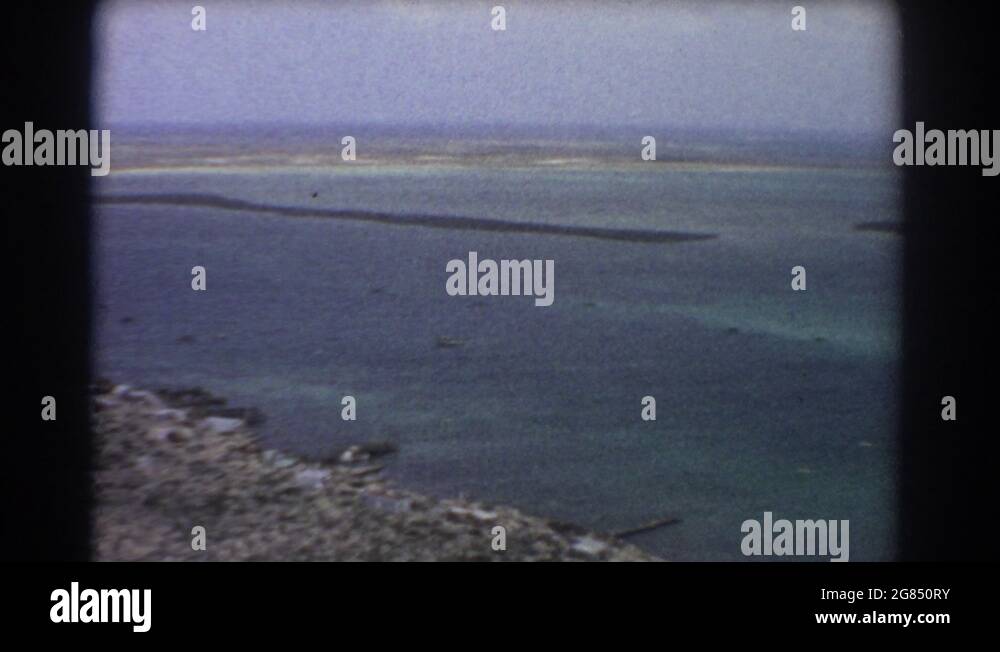 PERTH AUSTRALIA-1967: Flying Over A Watery Marsh Filled With Water ...