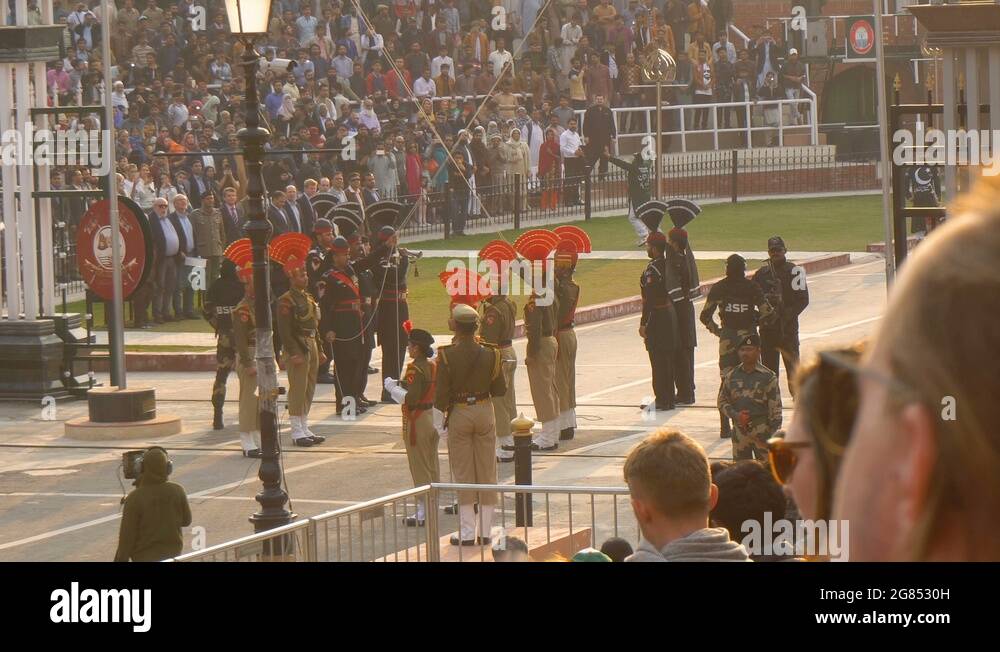 Indian and Pakistani Border Soldiers in Uniforms Performing Flag ...