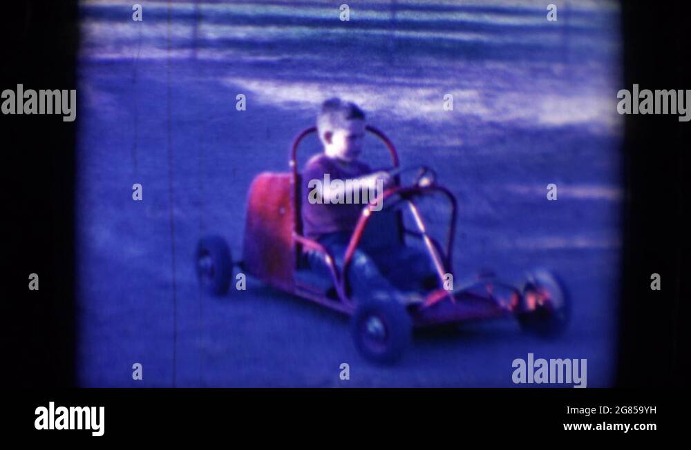 TUCSON ARIZONA USA-1958: Young Boy Driving A Little Red Go Kart In ...