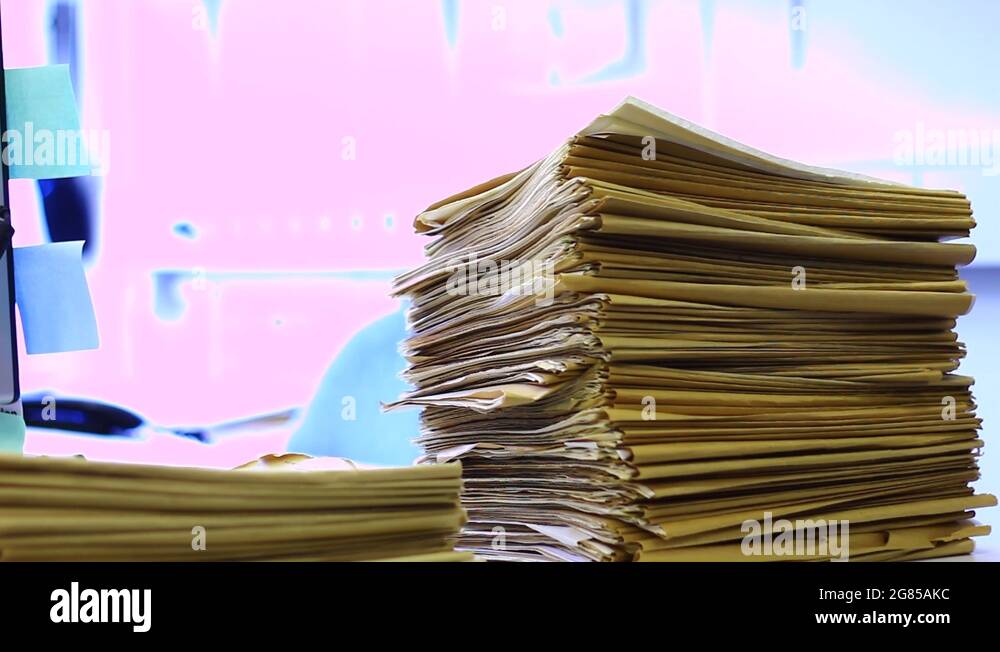 Stack of messy documents Stock Videos & Footage - HD and 4K Video Clips ...