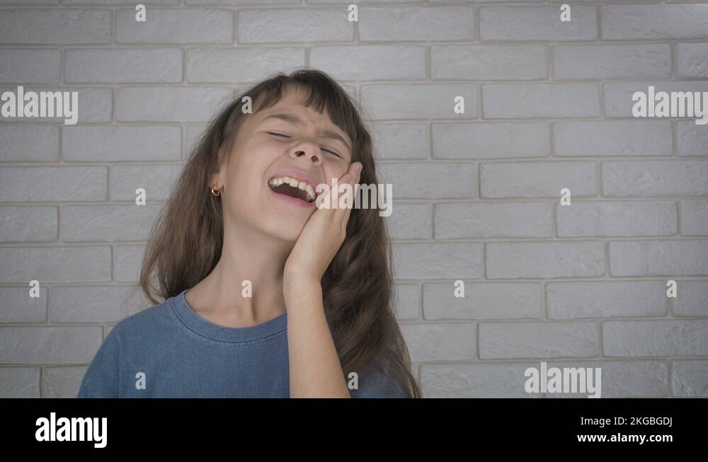 Child crying because of toothache Stock Video Footage - Alamy