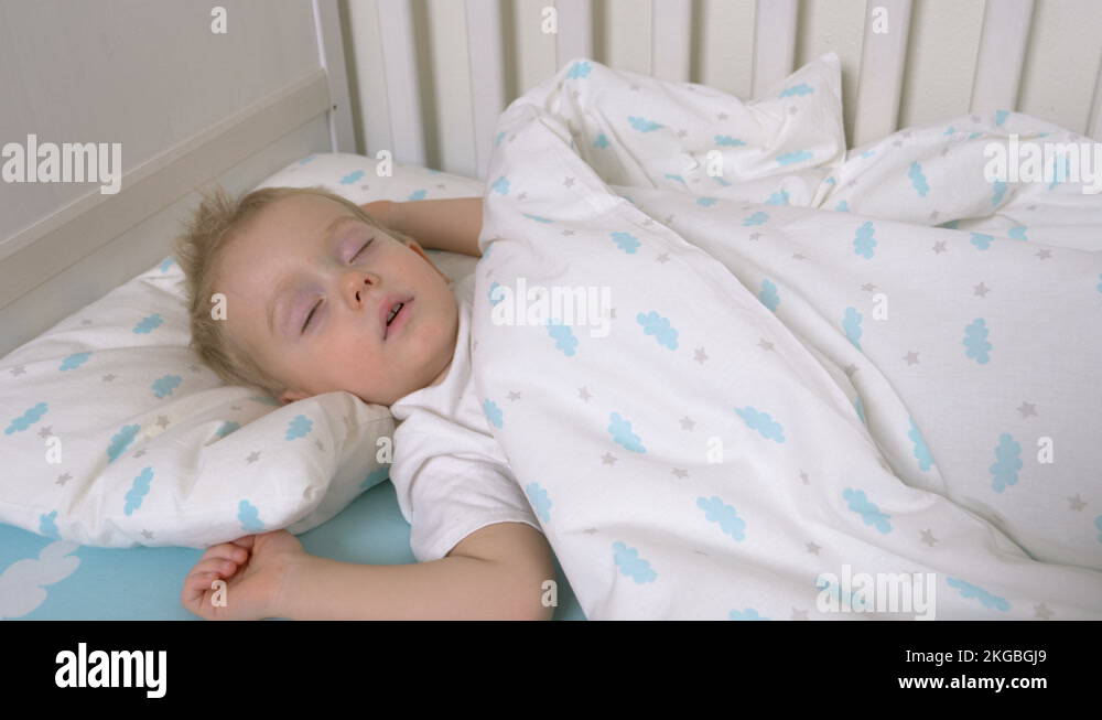 Cute baby boy is sleeping in daytime Stock Video Footage - Alamy
