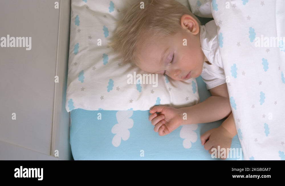 Cute baby boy is sleeping in daytime Stock Video Footage - Alamy