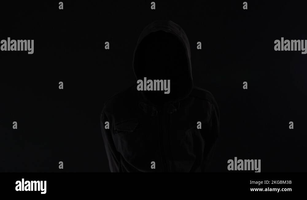 Hooded computer hacker click virtual screen Stock Video Footage - Alamy