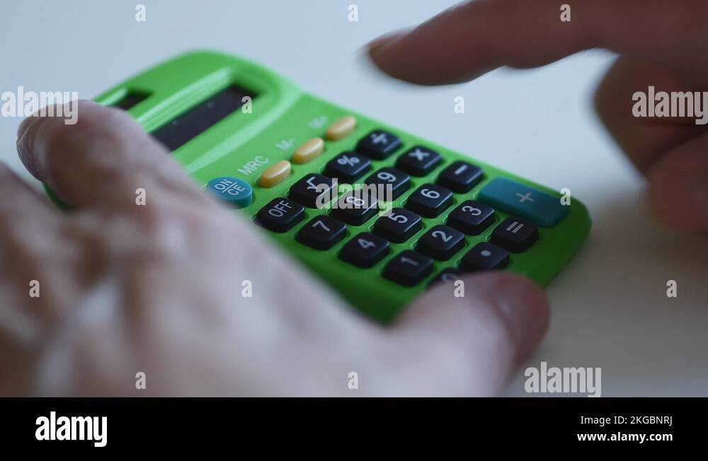 Green calculator Stock Videos & Footage - HD and 4K Video Clips - Alamy