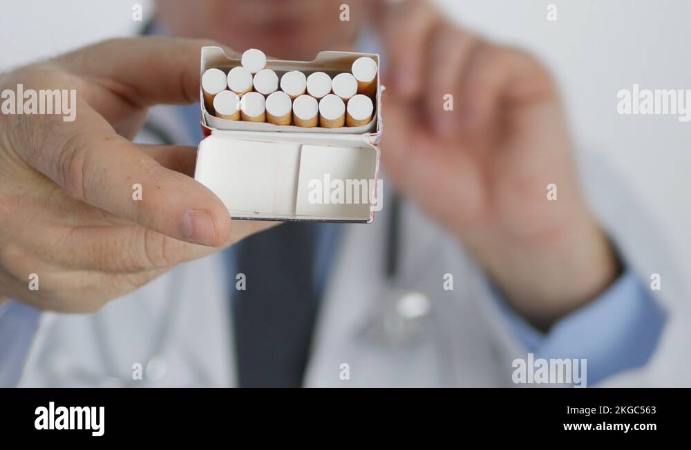 Anti Tobacco Campaign with Doctor Showing Cigarettes Pack Making No ...