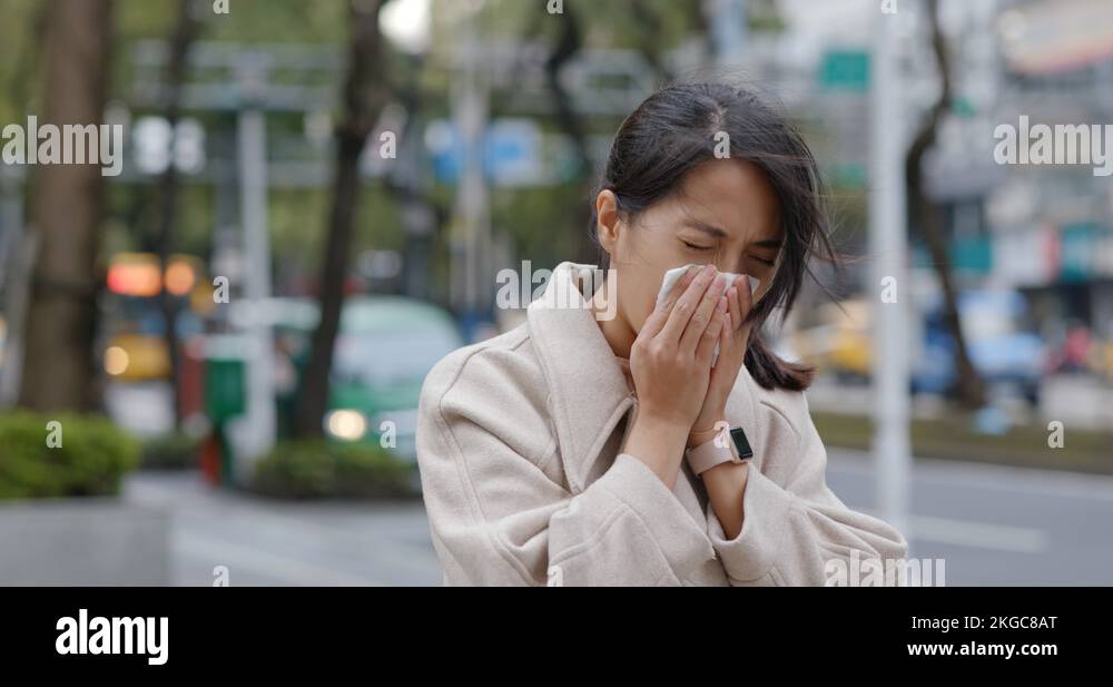 Woman sneeze city Stock Videos & Footage - HD and 4K Video Clips - Alamy