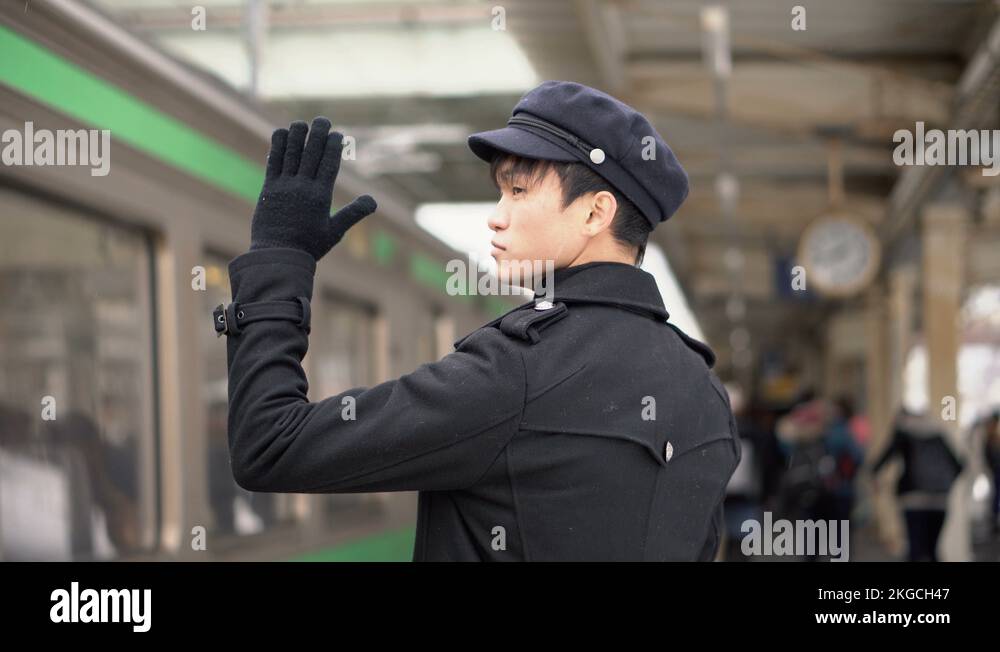 2 Clips - Japanese Railway Station Staff Signaling to Train with Hand ...