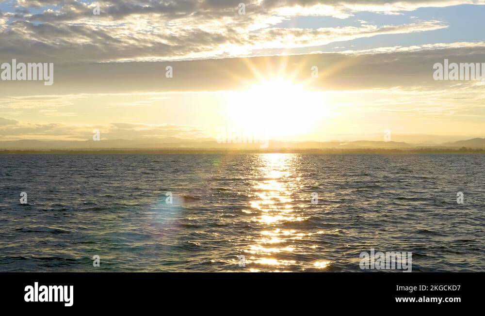 The sun sky and the river moving in the moment of Sunrise, nature video ...