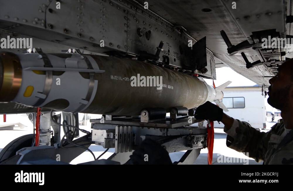 U.S. Air Force maintainer loading missile on A-10 Thunderbolt II at ...
