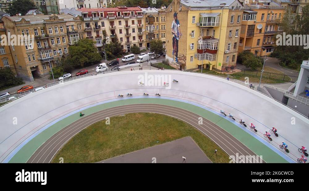 Velodrome in Kiev Cycling Track Cyclists in bunch cycling race Aerial ...