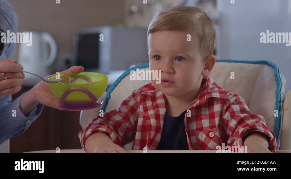 Child does not Want to Eat Food and Mother Trying to Feed Baby Boy ...