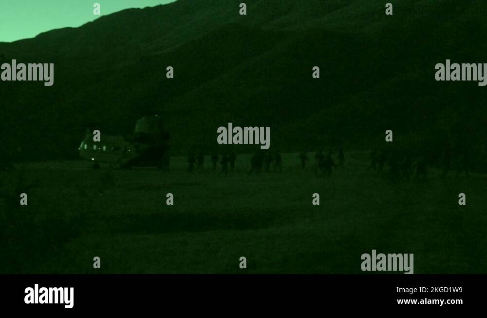 Night vision imagery of paratroopers disembarking CH-47 Chinook Stock ...