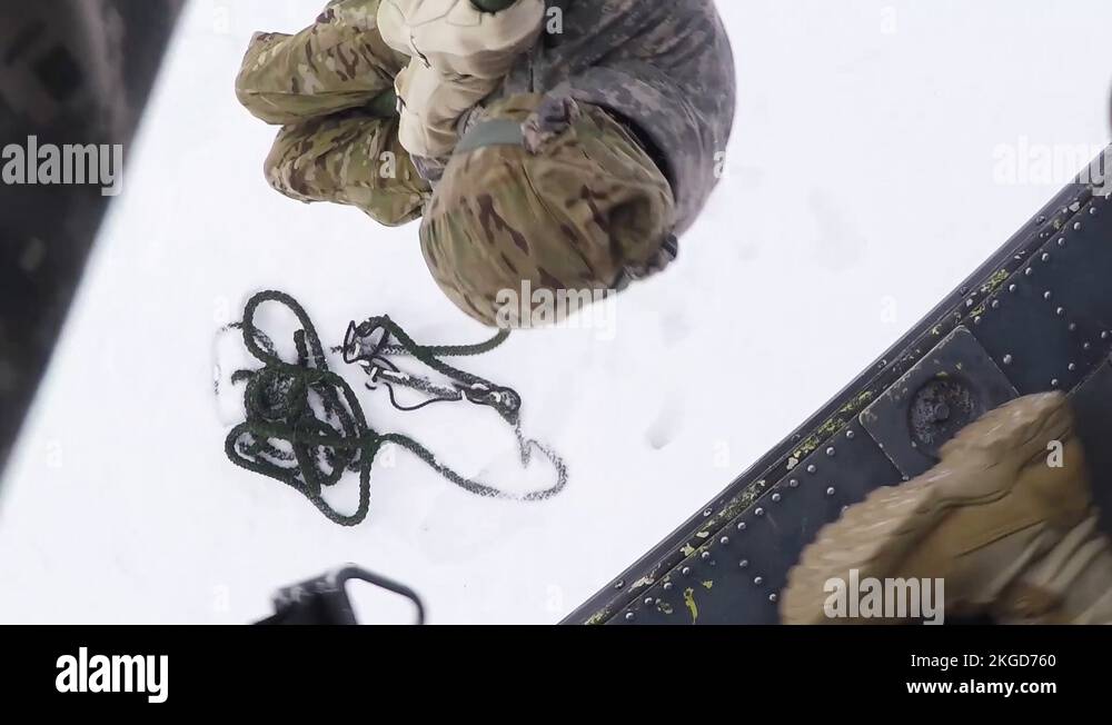Soldiers fast roping from UH-60 Black Hawk in Alaska Stock Video ...