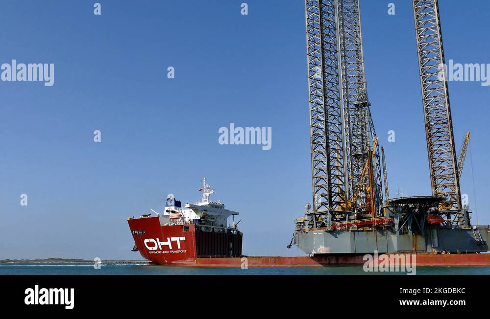 Semi submersible heavy lift cargo ship transporting an offshore oil rig ...