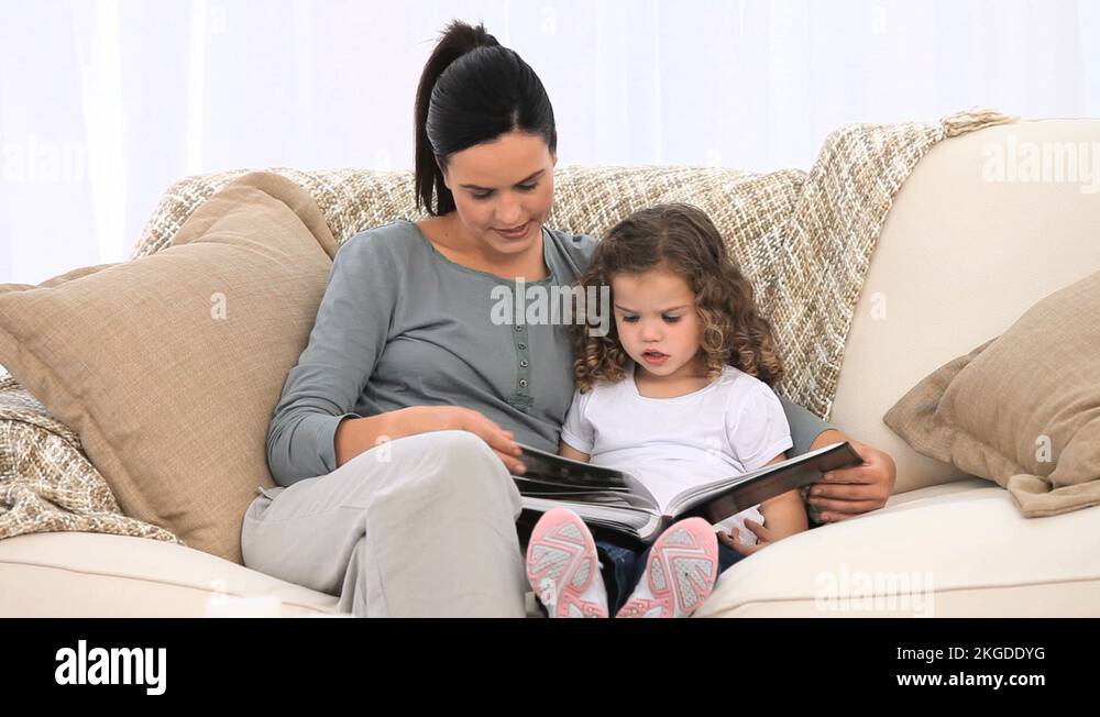 Mother daughter album Stock Videos & Footage - HD and 4K Video Clips ...