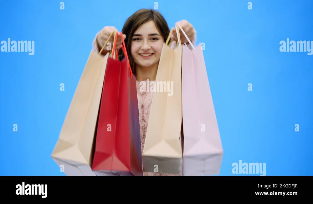 Young pretty girl doing incredibly pleasing shopping. During this time ...