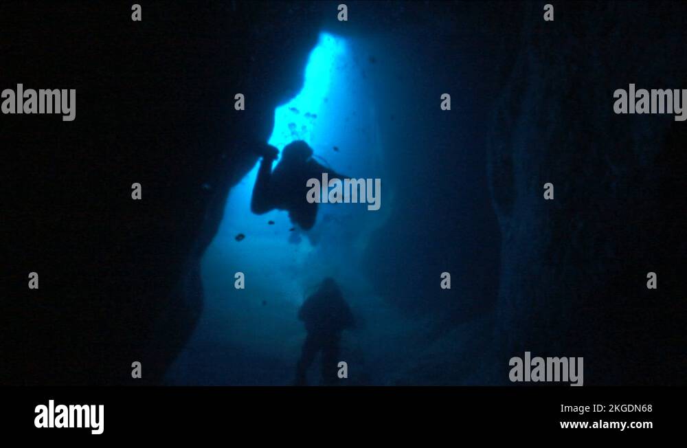 cave diving underwater scuba divers exploring caverns tunnels cave dive ...