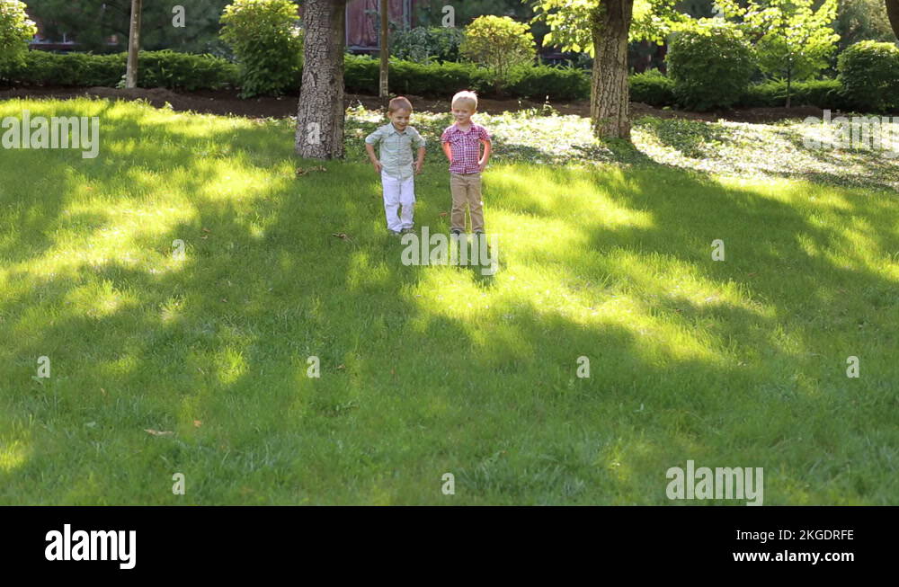 Kids running grass sun Stock Videos & Footage - HD and 4K Video Clips ...