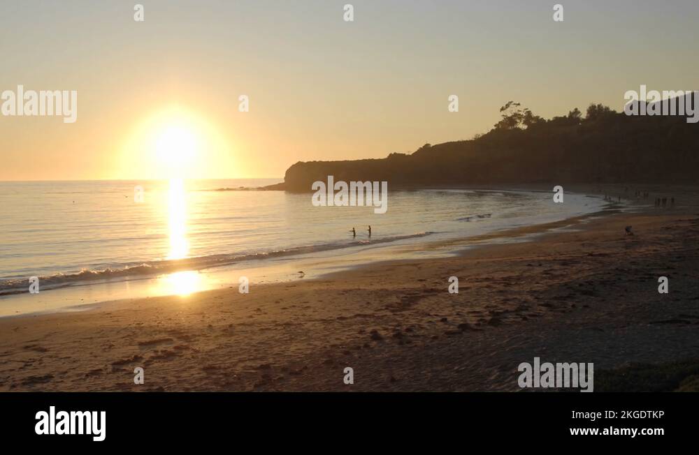 Zoom in time lapse of sun setting over the Pacific Ocean at Refugio ...