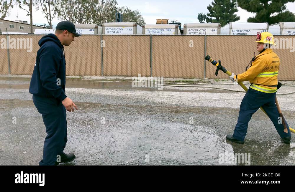 Instructor performing training exercises with firefighters in Los ...