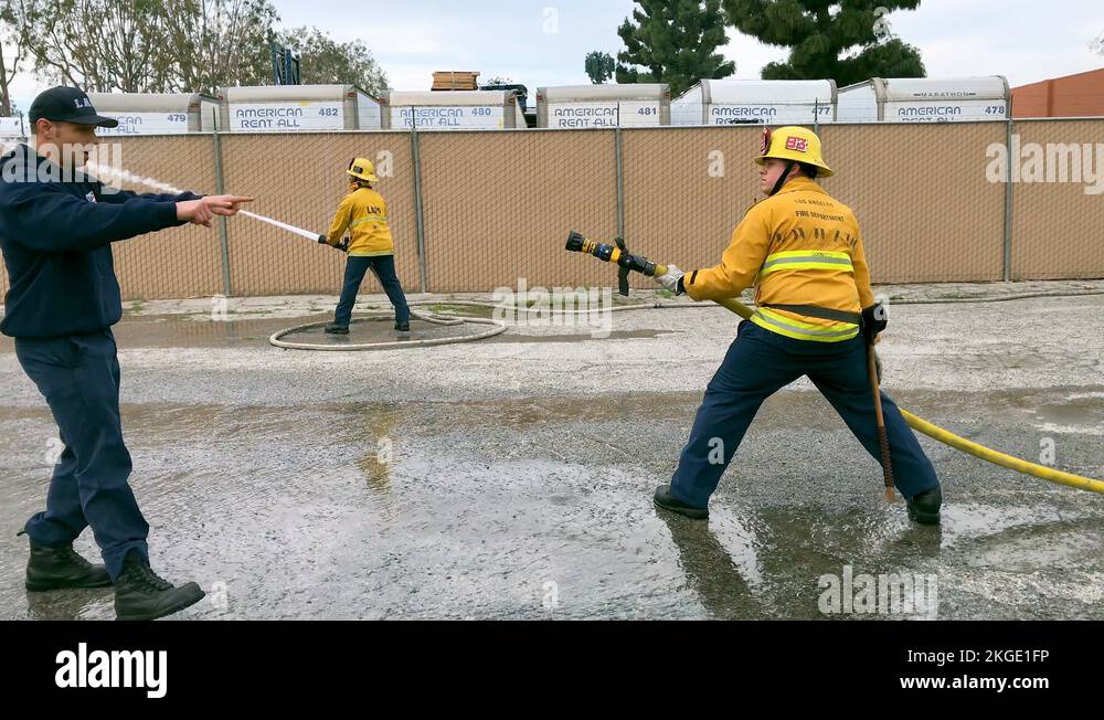 Instructor performing training exercises with firefighters in Los ...