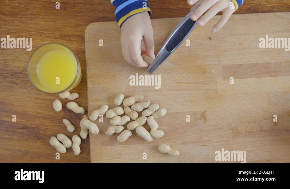 Holding peanuts Stock Videos & Footage - HD and 4K Video Clips - Alamy