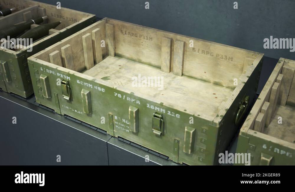 Robot packing military boxes with RPG missiles. Packing line. Warehouse ...