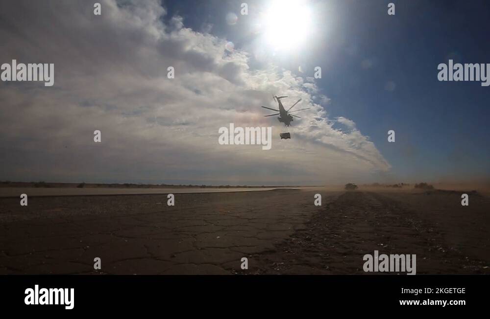 CH-53 Super Stallion in flight with sling load Stock Video Footage - Alamy