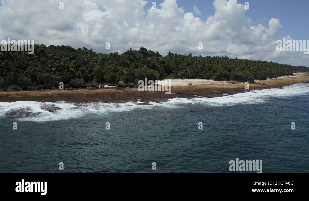 Epic zoom as blue ocean waves crash at Siargao rock pools 4K Drone ...