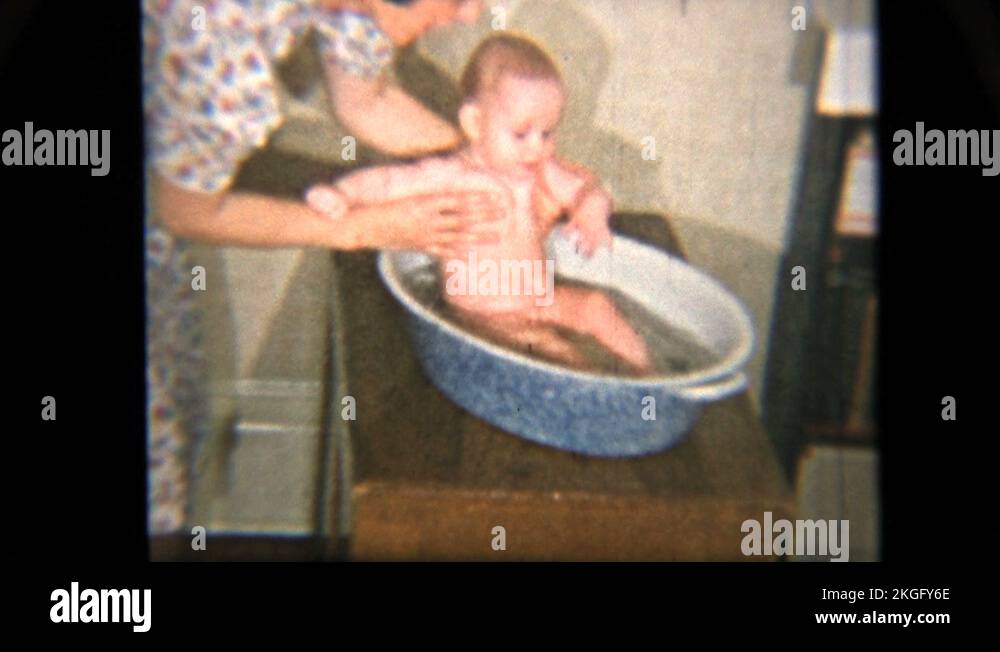 Baby Girl Bathing In A Basin (1939 Vintage 8mm film Stock Video Footage ...