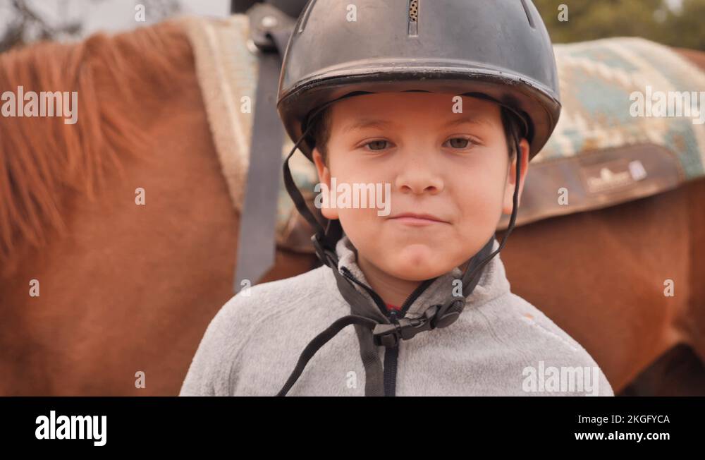 Kid ride horse helmet Stock Videos & Footage - HD and 4K Video Clips ...