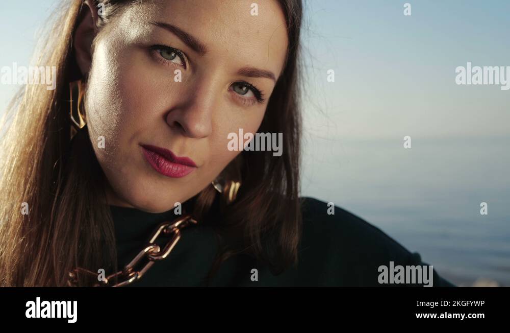 Girl model looks directly into the camera during a photo shoot Stock ...