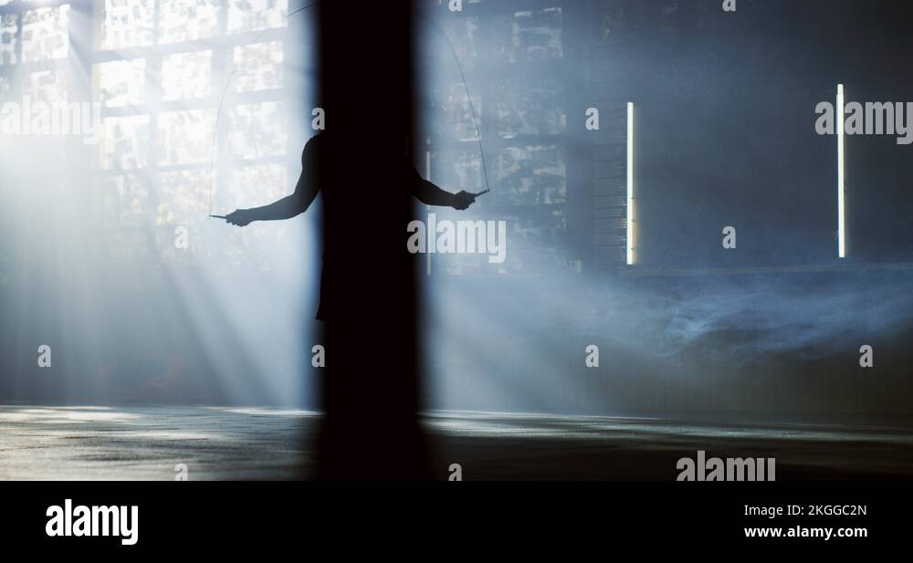 Strong Muscular Male Bodybuilder Crossfit Workout With Jump Rope At The ...