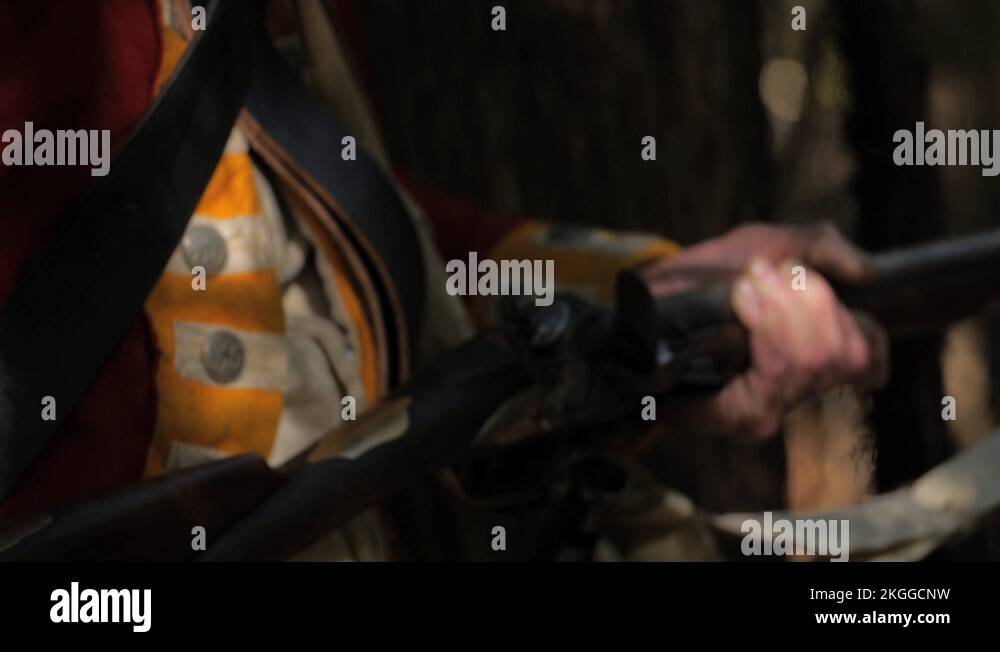 Revolutionary War - in the midst of battle, British soldiers loads his ...