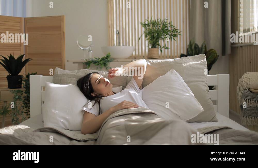 Girl waking up bed Stock Videos & Footage - HD and 4K Video Clips - Alamy