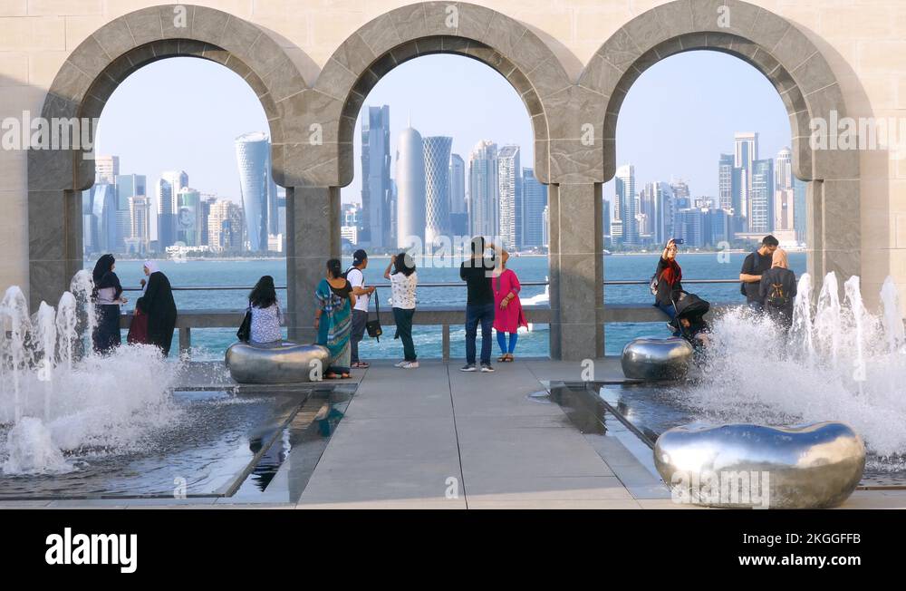 Crowd of people walking towards a viewpoint to center of Doha with ...
