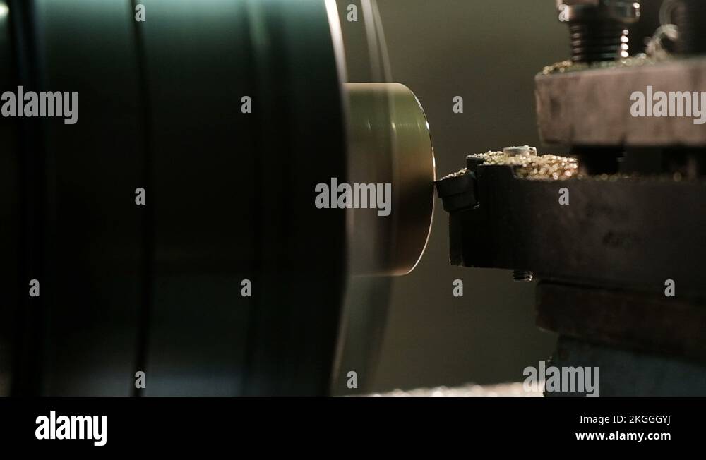 Facing operation of a brass blank on turning machine with cutting tool ...